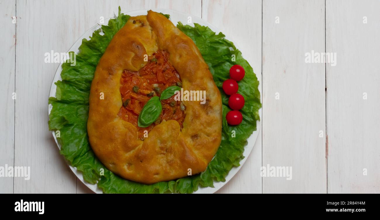 su mustazzeddu, typical Sardinian bread topped with tomato, garlic ...