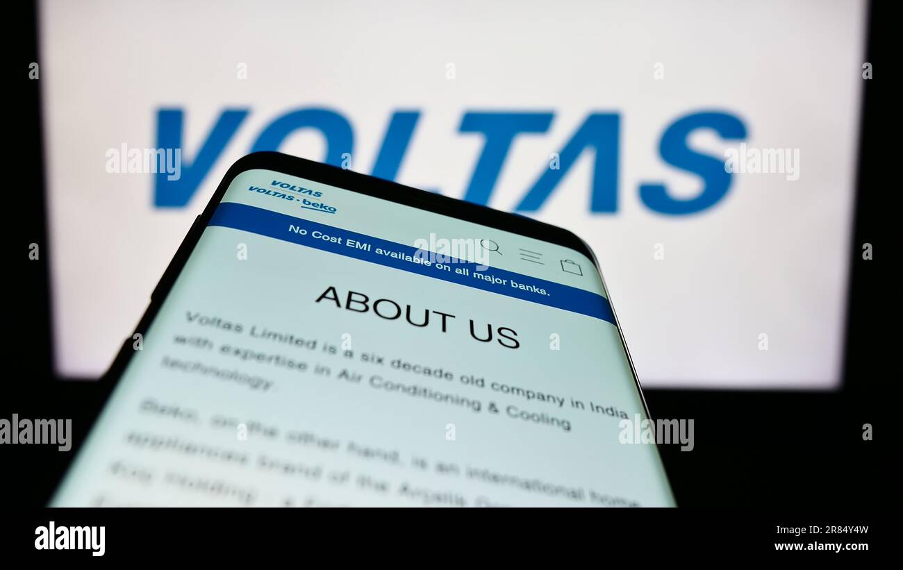 Mobile phone with webpage of Indian home appliances company Voltas ...