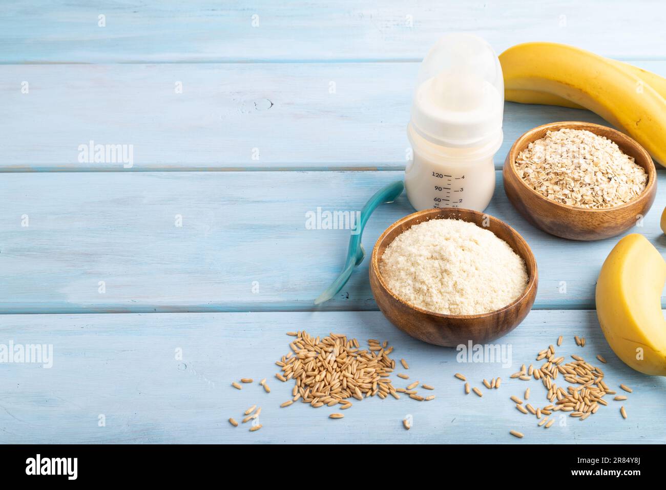 Powdered milk and oatmeal, banana baby food mix, infant formula ...