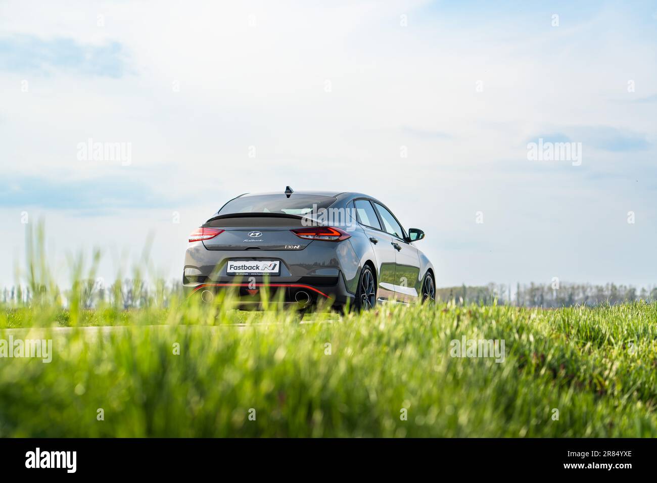 A rear view of a sleek 2023 Hyundai i30 Fastback N Performance vehicle ...