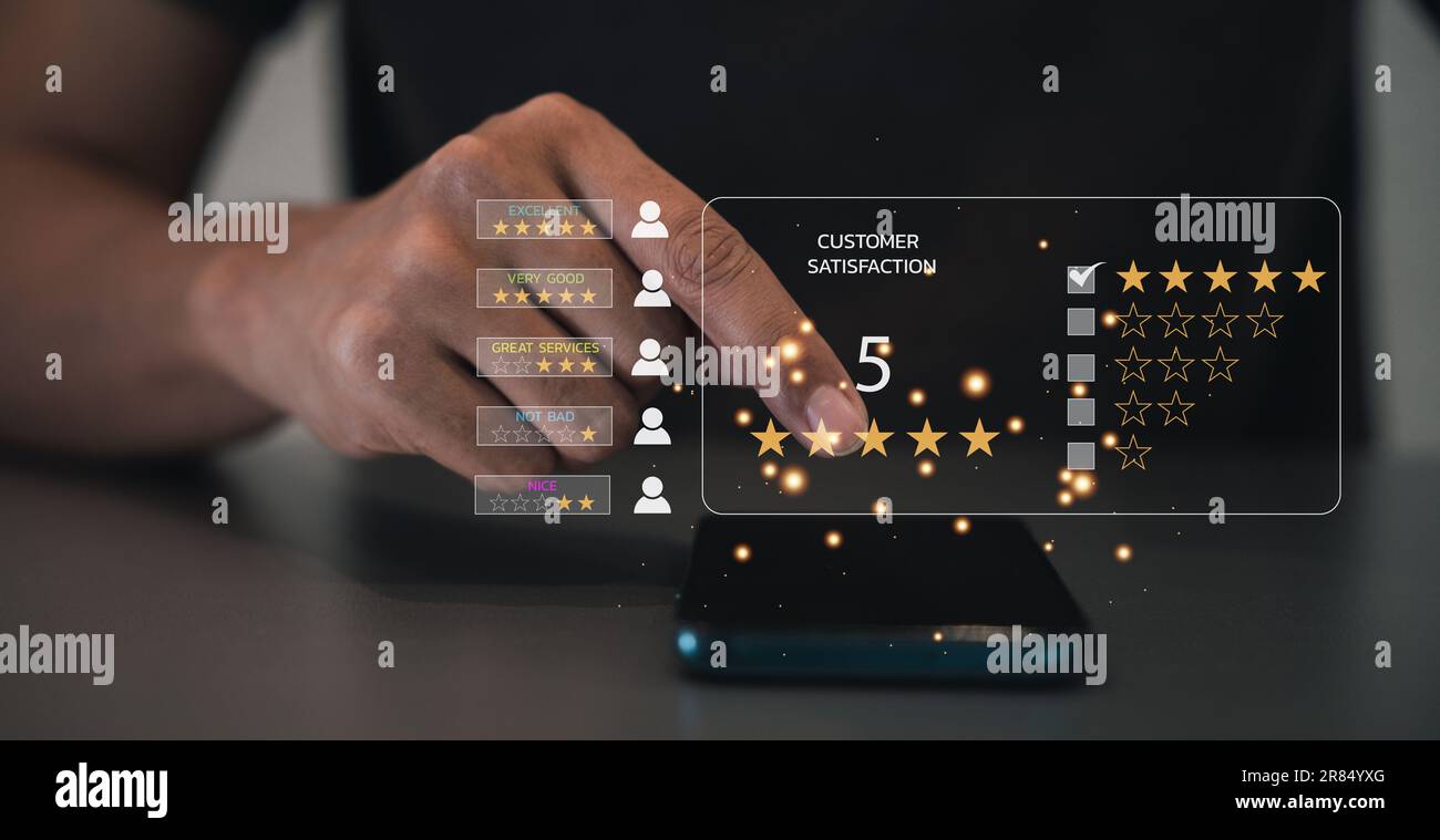 Close-up of man's hand using smartphone to rate service with 5-star ...