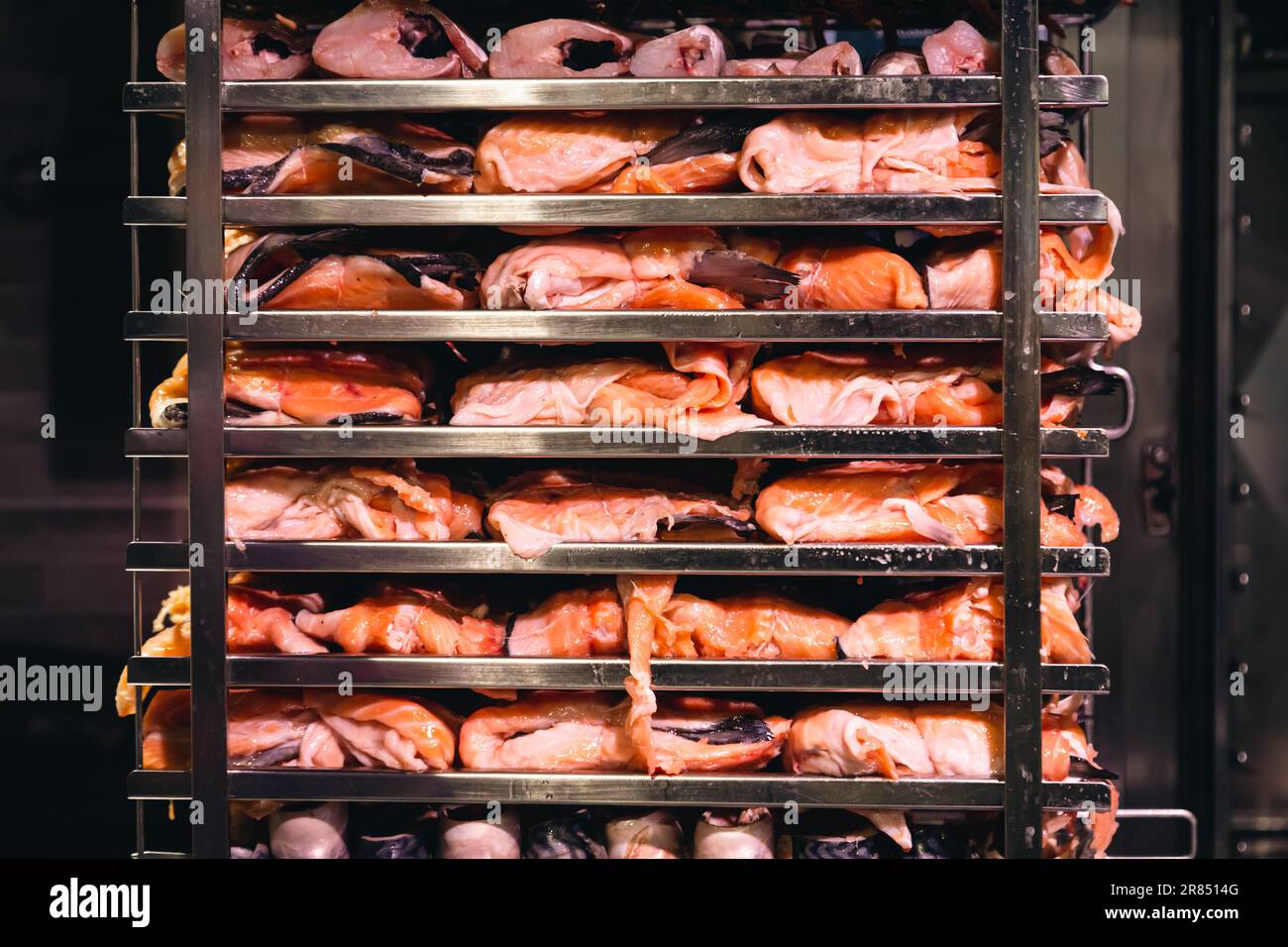 Racks of salmon smoking in a small smoker Stock Photo - Alamy
