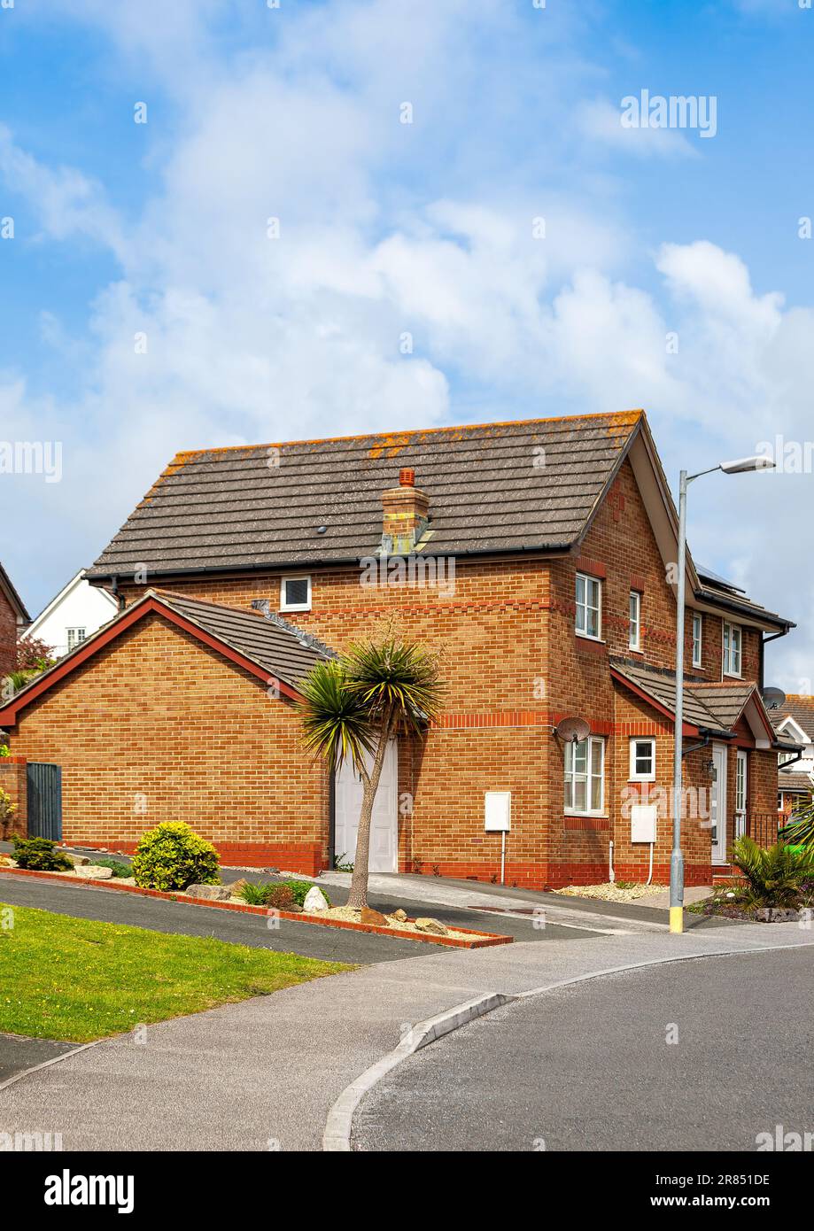 Typical English street and traditional houses with garage Stock Photo ...