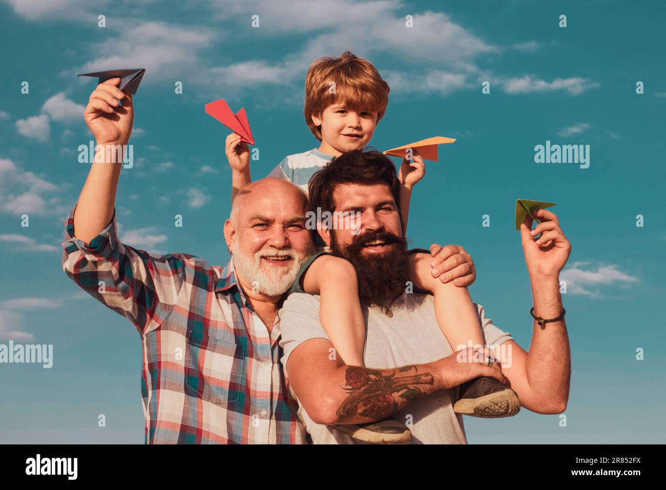 Kid pilot with toy jetpack against sky background. Kids playing with ...