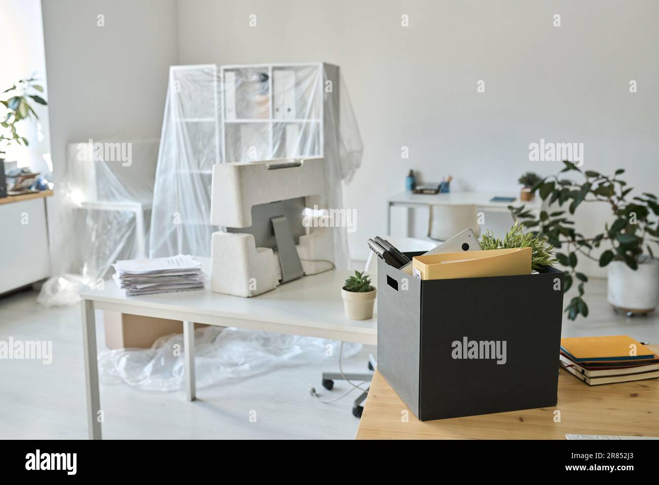 Horizontal image of office stuffs packing in box with furniture ...