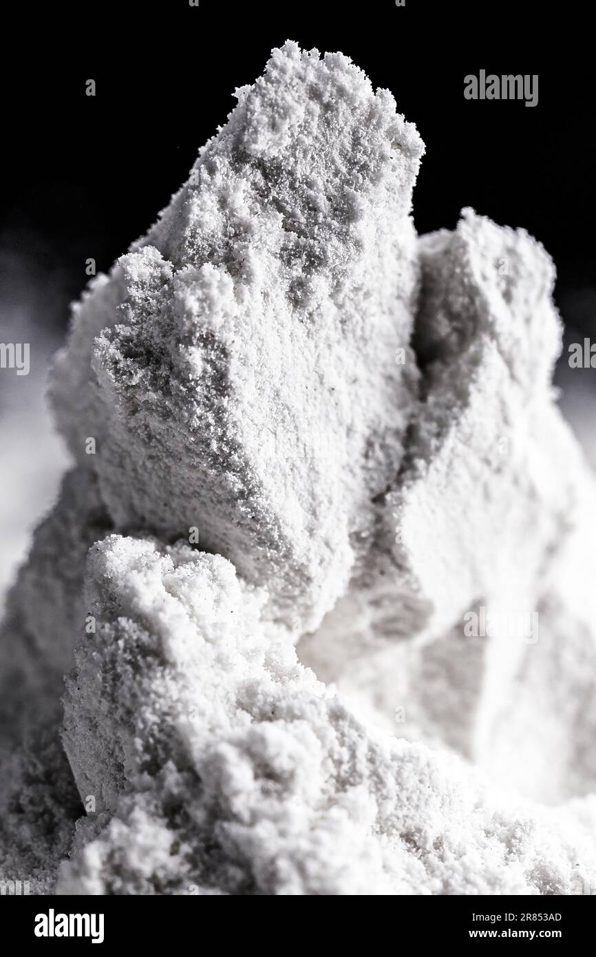 Kaolin on isolated black background, is an inorganic mineral ...