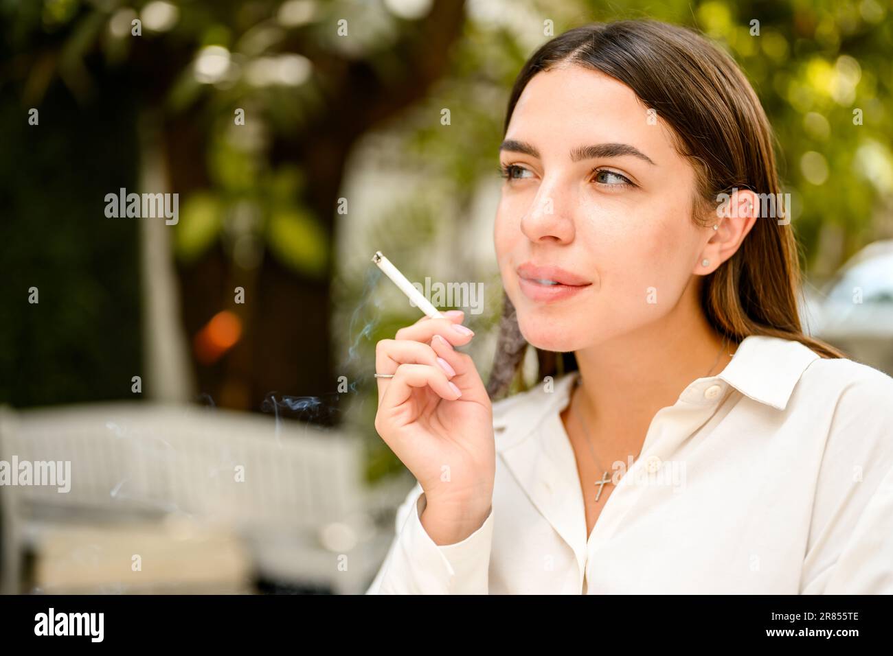 Young woman smoking cigarette, Unhealthy habit and outdoor lifestyle ...