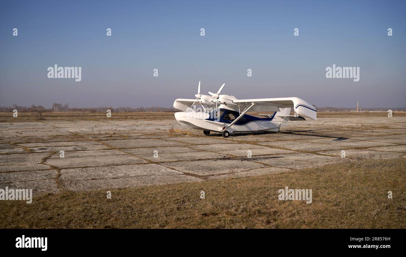 White private jet. White propeller plane. Private small plane in the ...