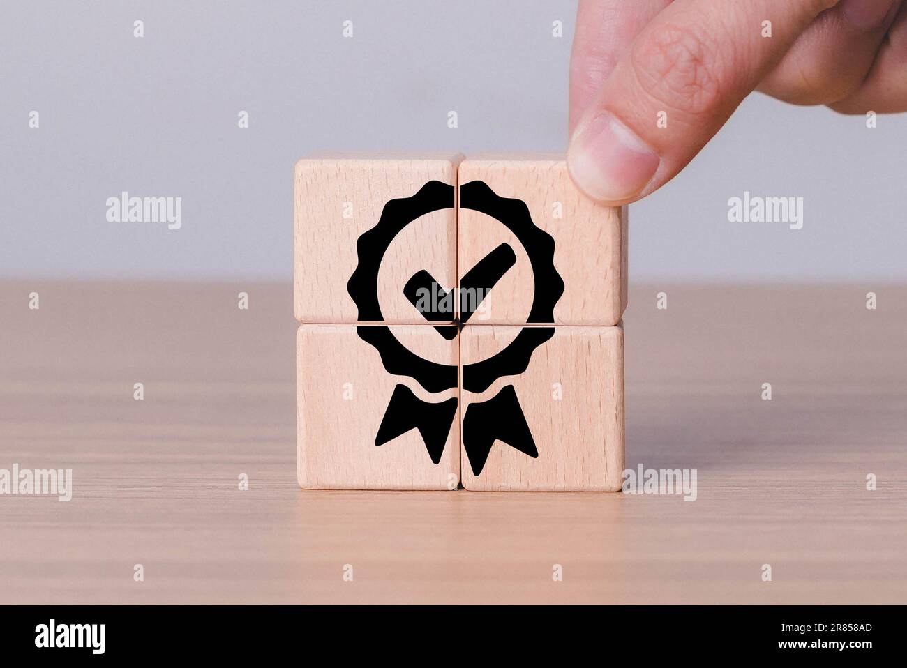 businessman's hand completed sign of top service quality assurance ...