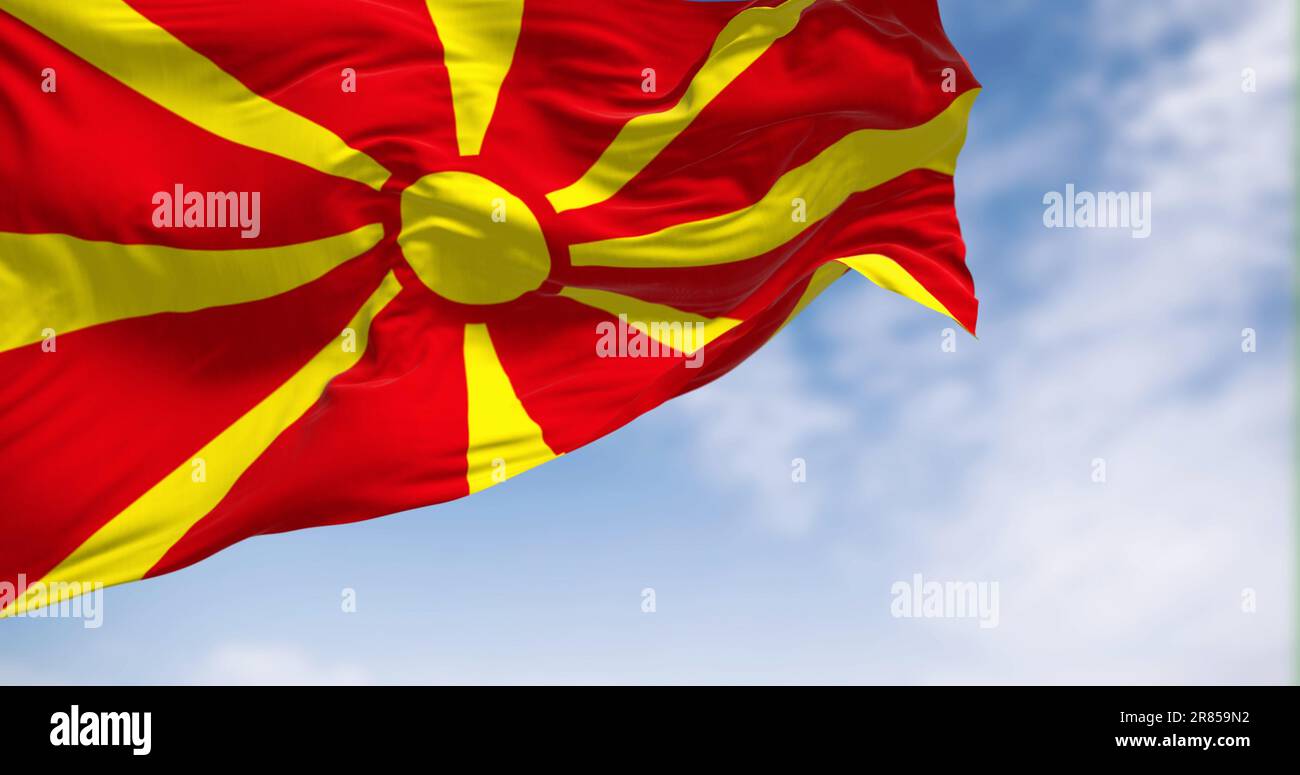 The national flag of North Macedonia that waving in the wind on a clear ...