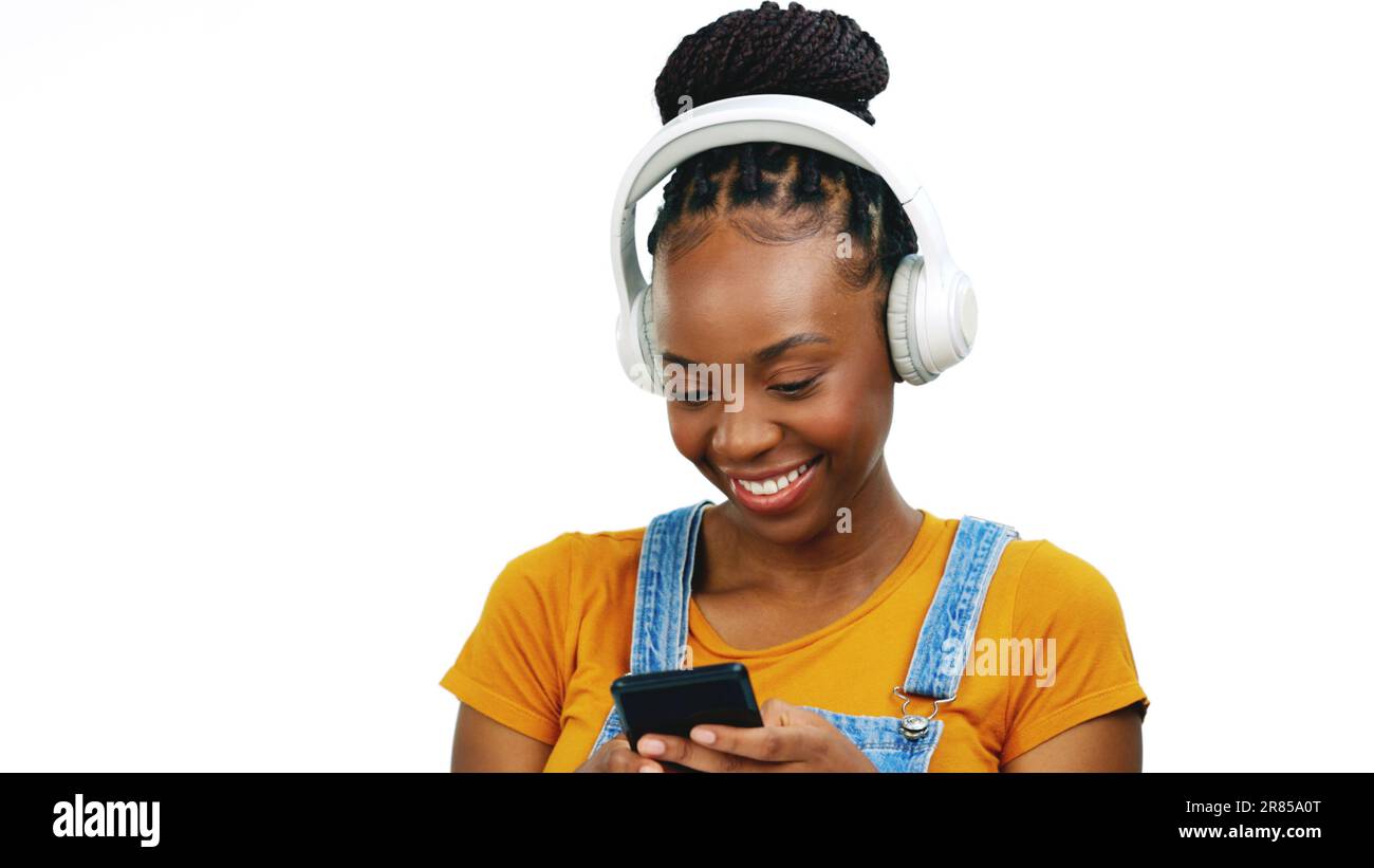 Black woman listening to music with headphones, smartphone and dancing ...
