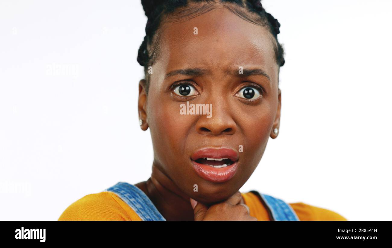 Face, fear, shocked, concerned and worried with a black woman in studio ...