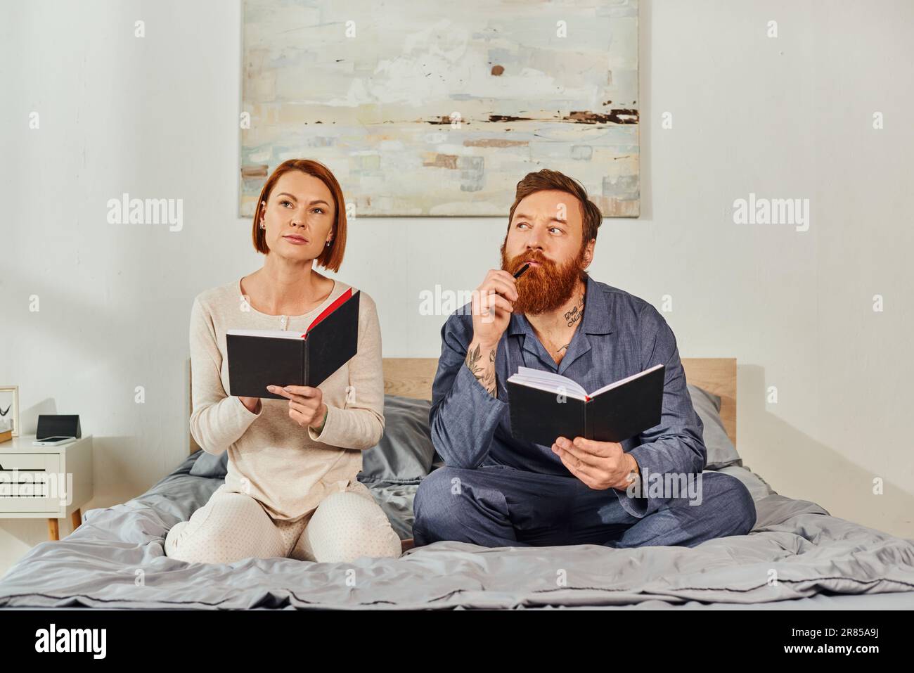 writing experience, notebook romance, pensive married couple taking ...