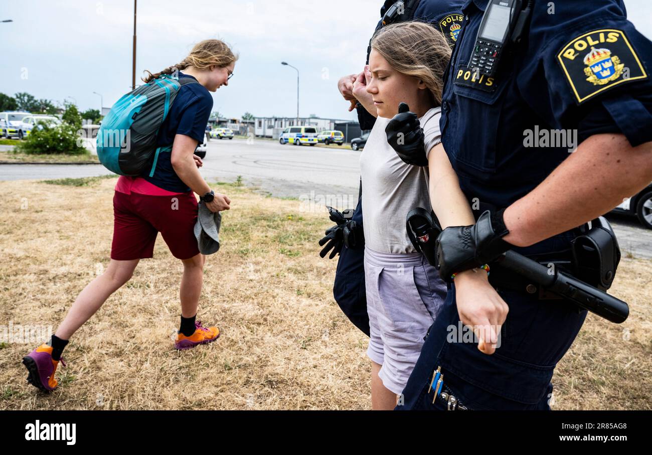 Malmo, Sweden. 19th June, 2023. Police talk with Greta Thunberg as they ...