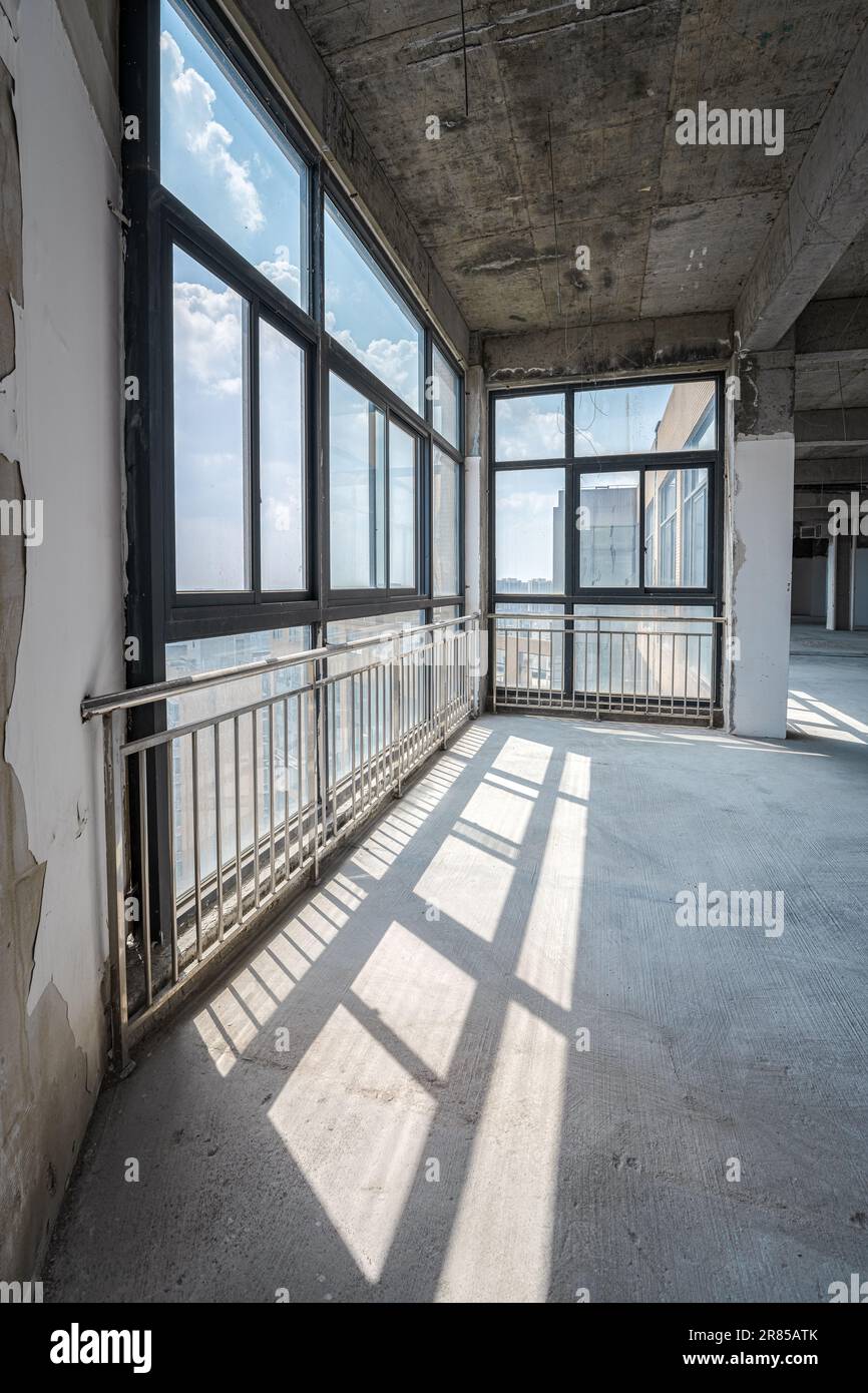 The sunlight is shining inside the newly constructed building Stock ...