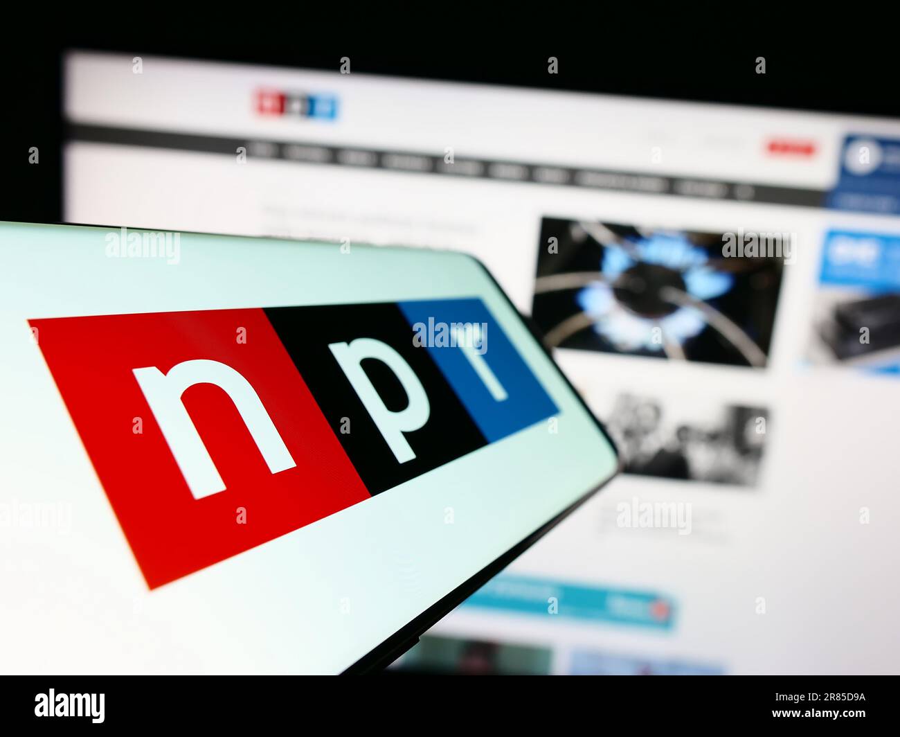 Mobile phone with logo of media organization National Public Radio (NPR ...