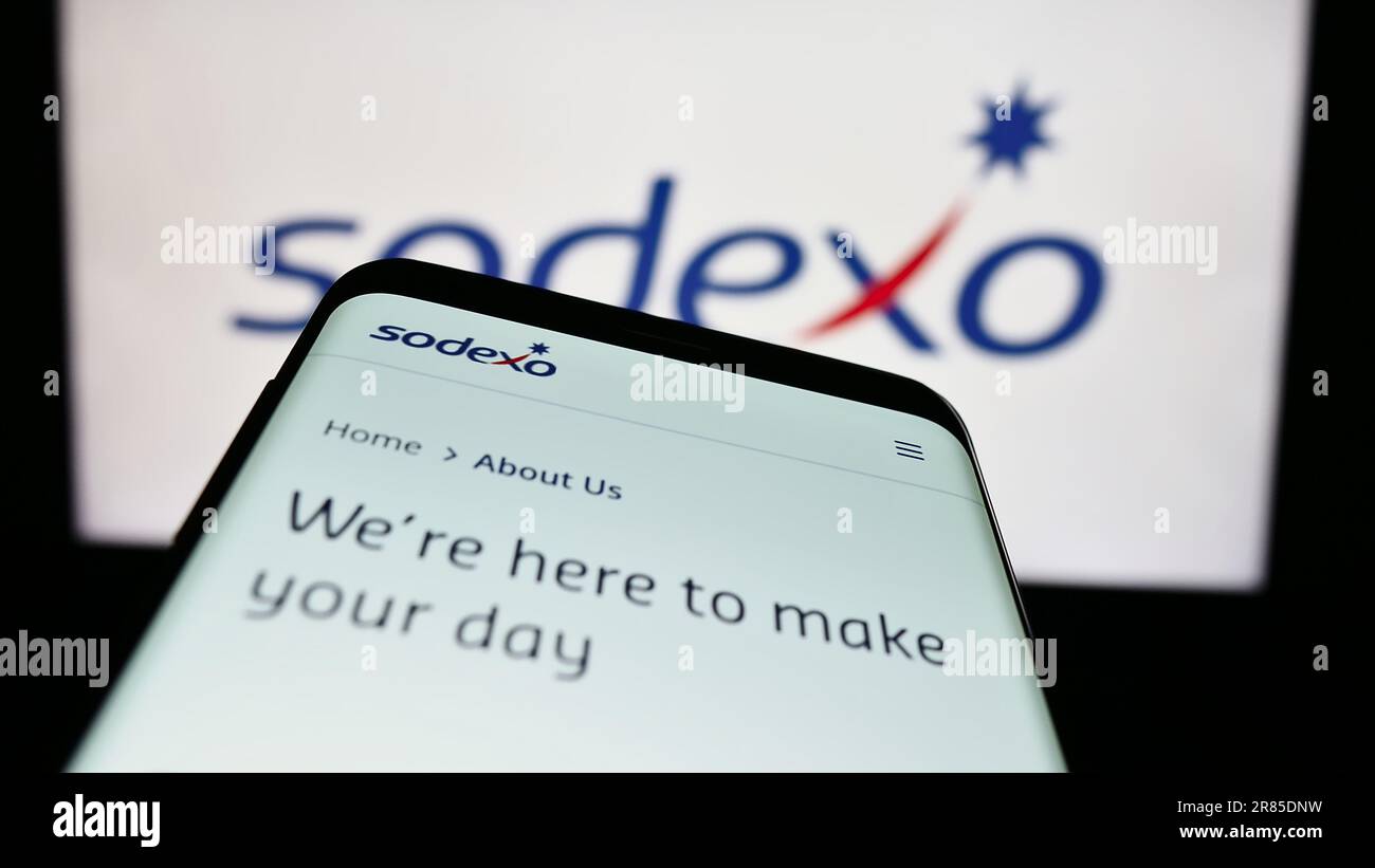 Mobile phone with website of French facility management company Sodexo ...