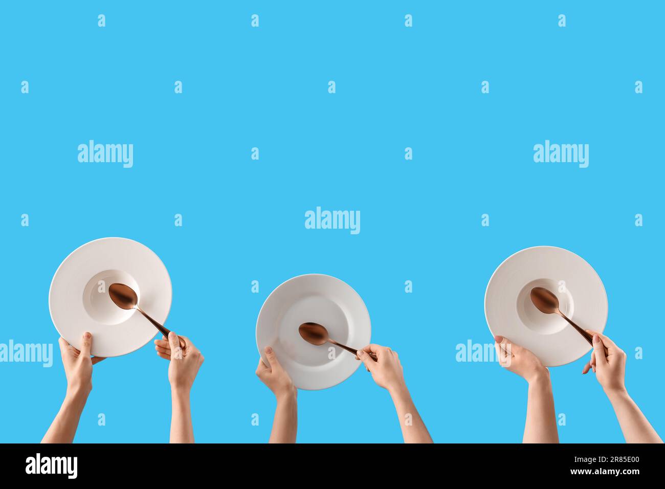 Female hands holding plates hi-res stock photography and images - Alamy