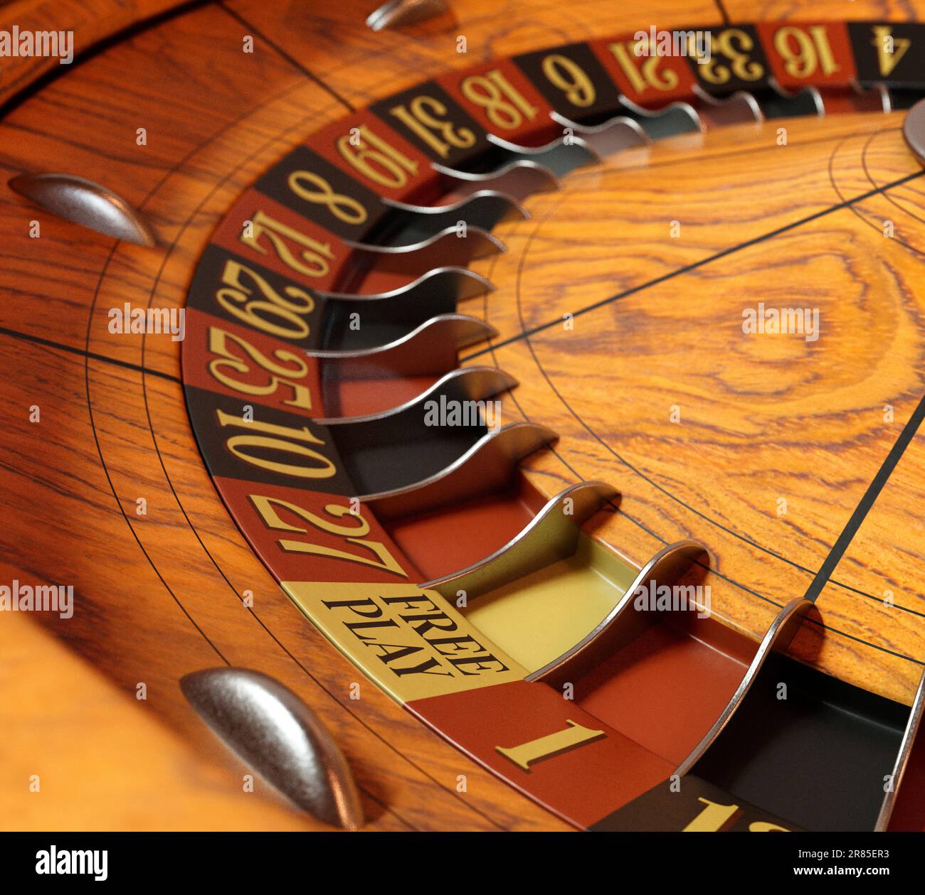 A closeup of a vintage antique roulette wheel with red and black ...