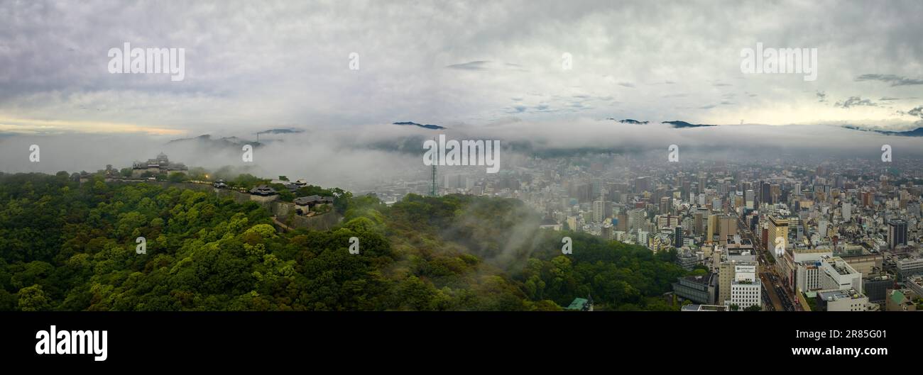 Matsuyama, Japan - June 11, 2023: Early morning fog over historic ...