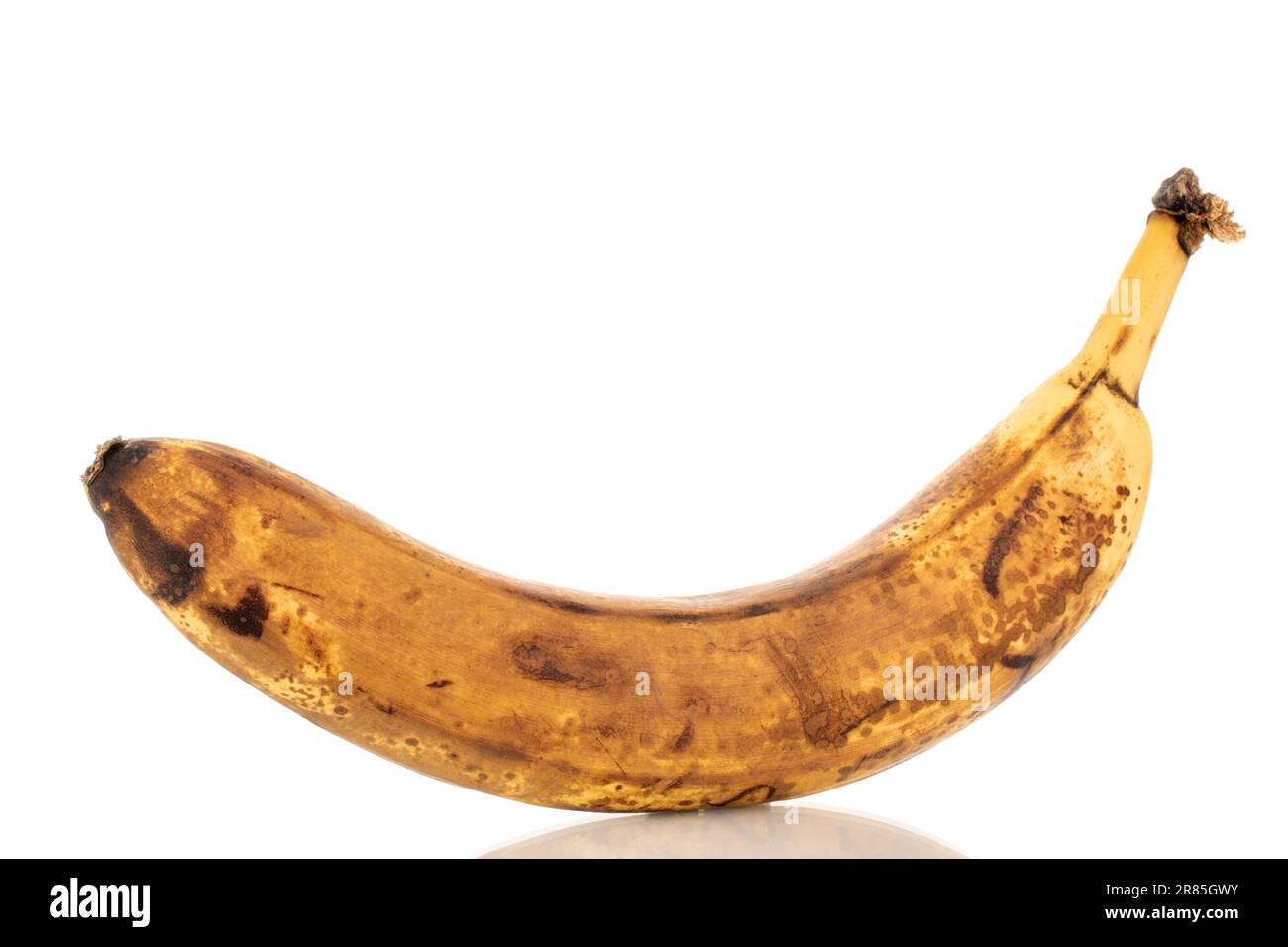 One overripe banana, macro, isolated on white background Stock Photo ...