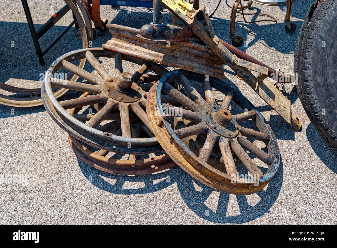 For sale in a pile are old antique rusty wooden Model T or A car or ...