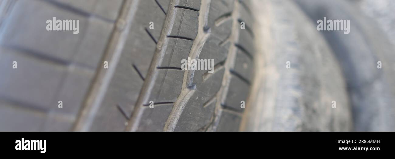 Old damaged and worn black tire thread Stock Photo - Alamy