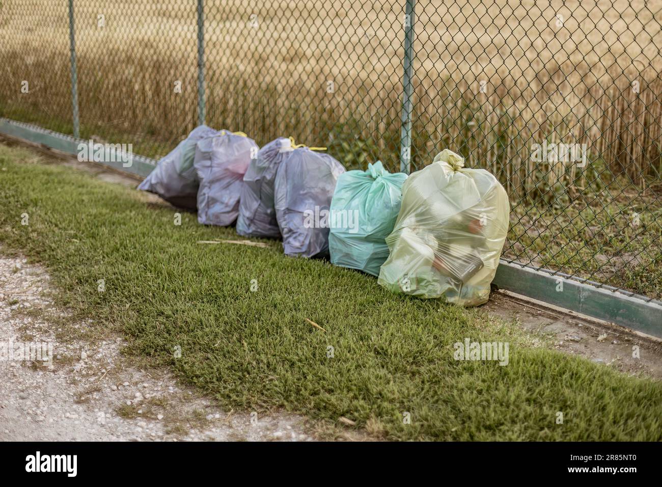 A striking image of abandoned trash bags, irresponsibly left by the ...