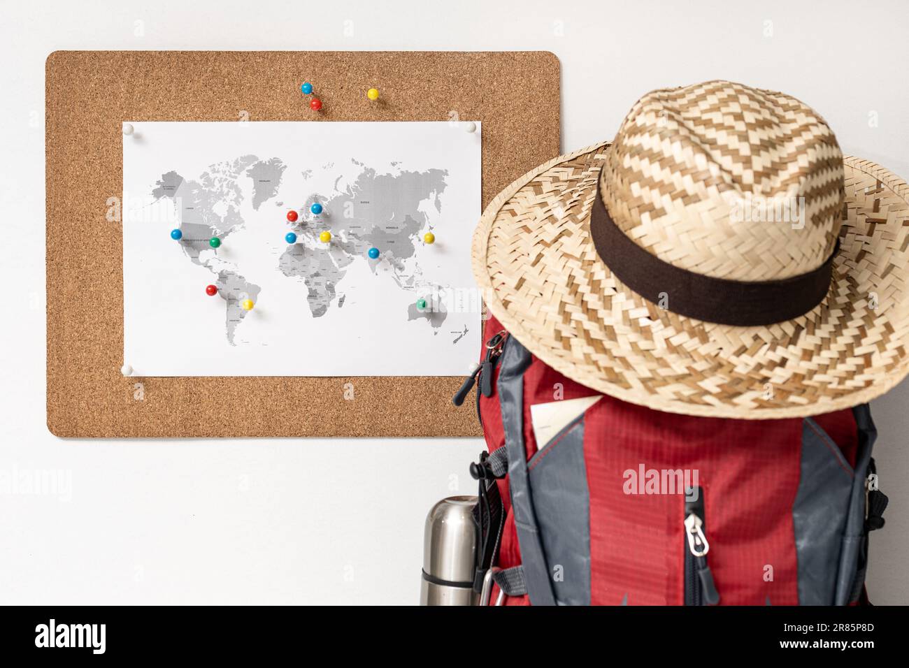 Planning Travel destination concept. Corkboard with world map and pins ...