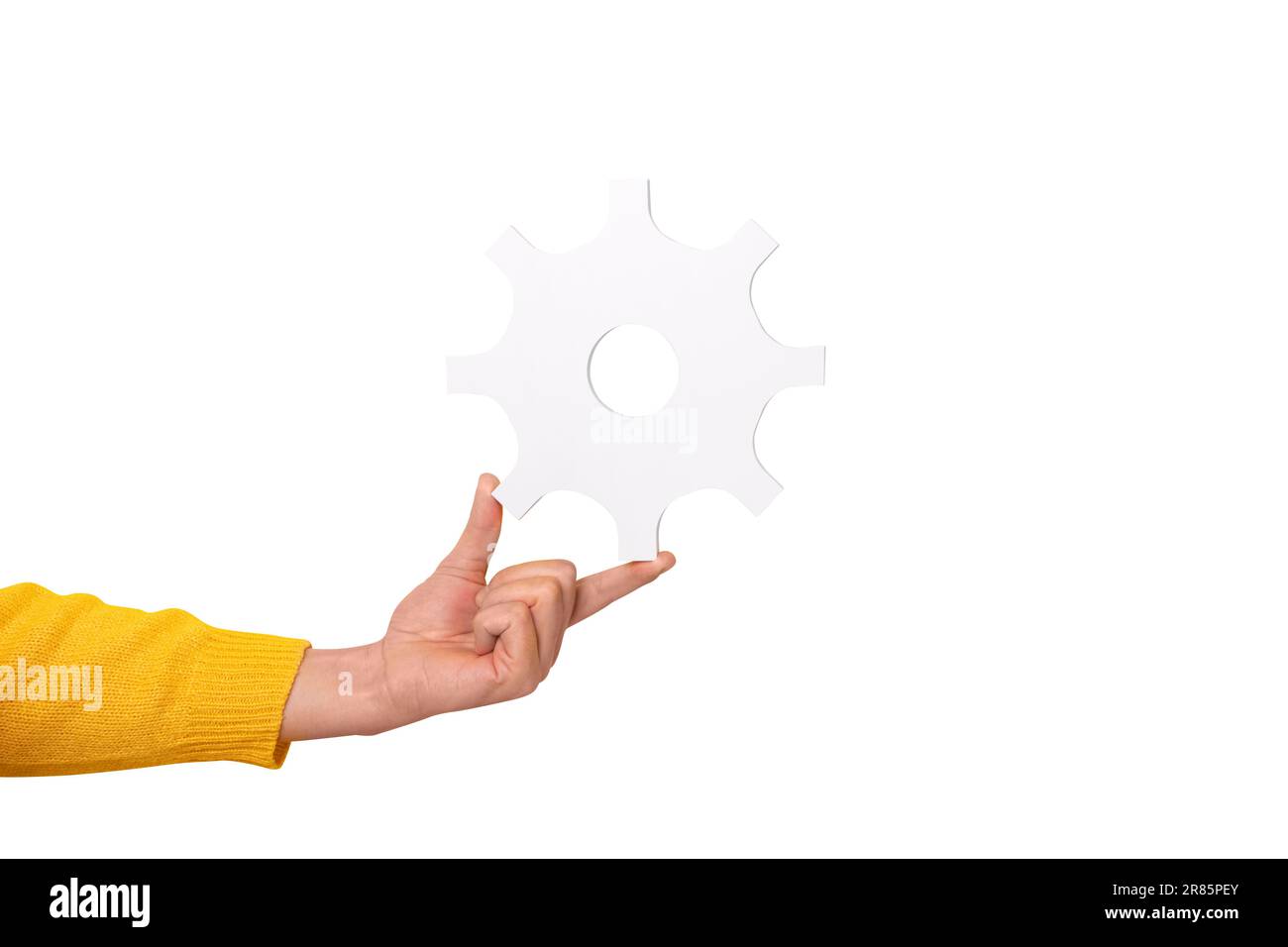 hand holding gear symbol isolated on white background Stock Photo - Alamy