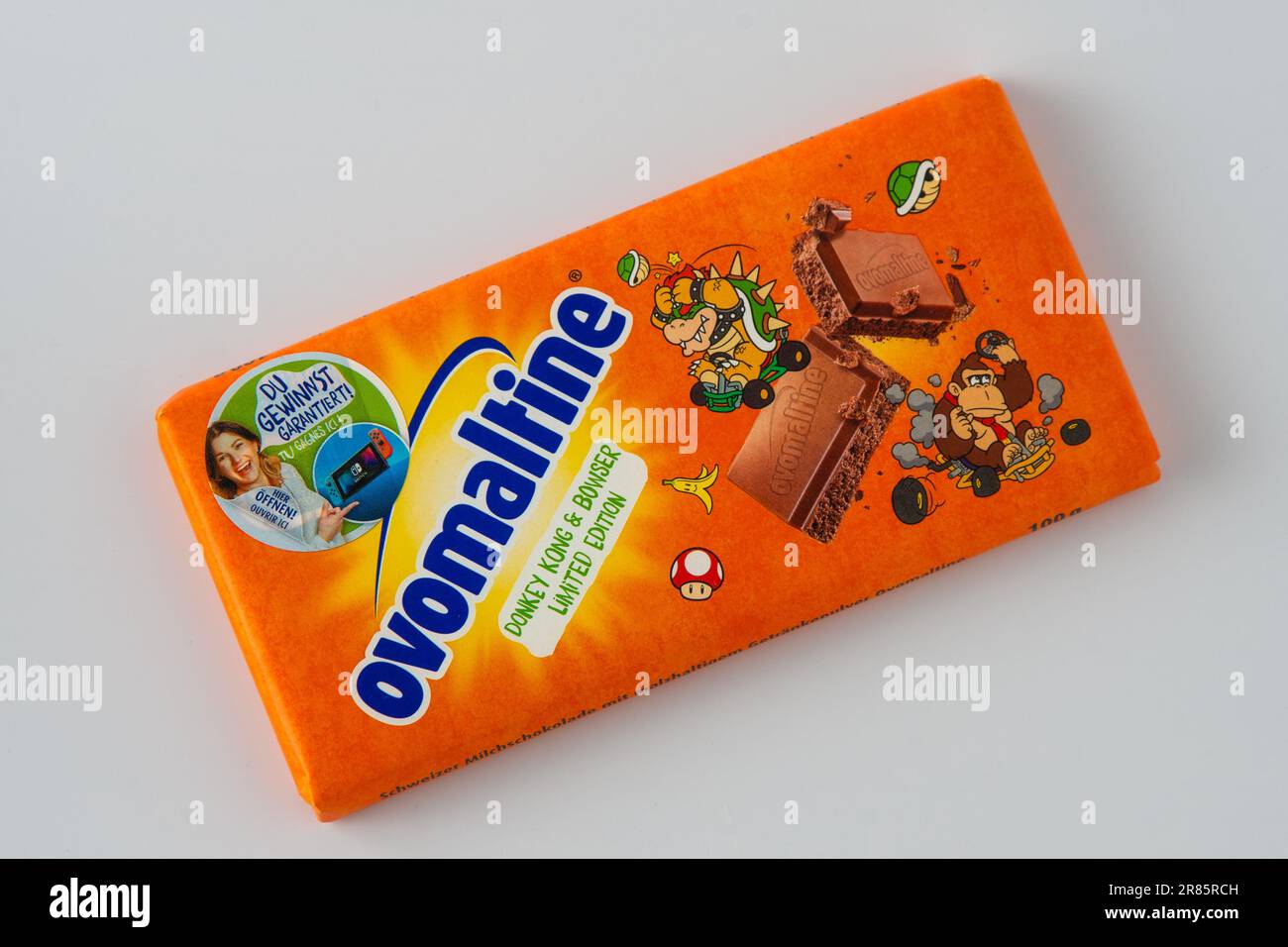 Swiss chocolate from Ovomaltine. Tiles in orange packaging. Children's ...