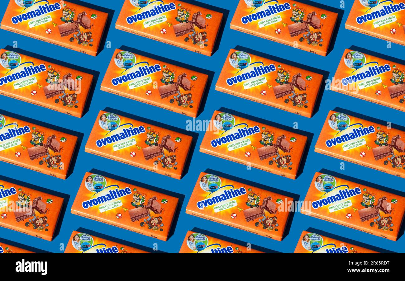 Swiss chocolate pattern from Ovomaltine. Tiles in orange packaging ...