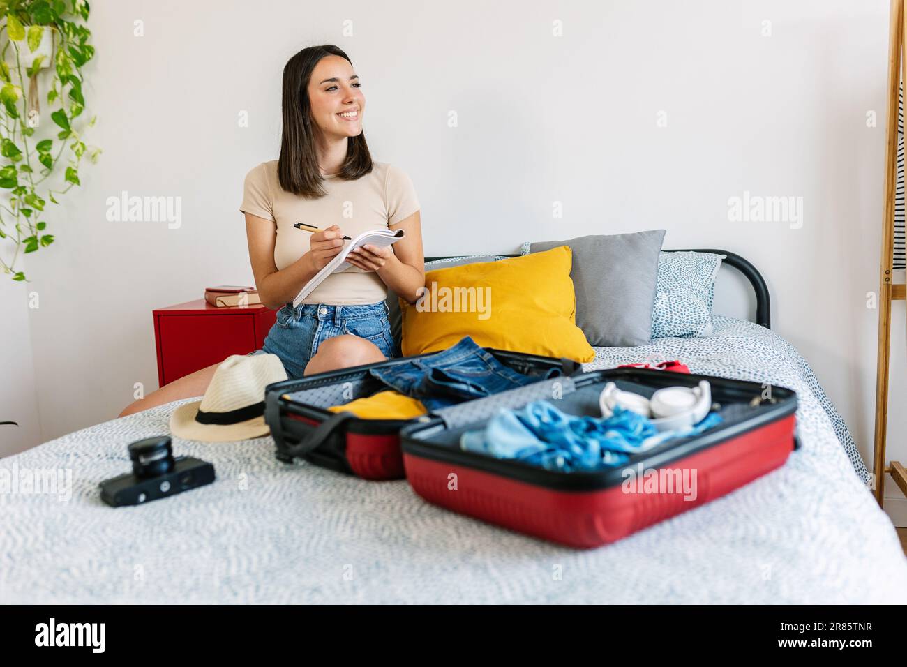 Female travel packing checklist hi-res stock photography and images - Alamy