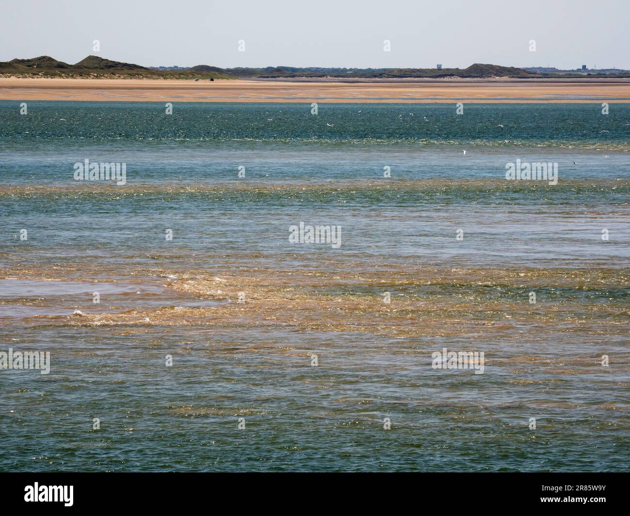 The tide rushing out of the Duddon estuary at Hodbarrow, Millom ...