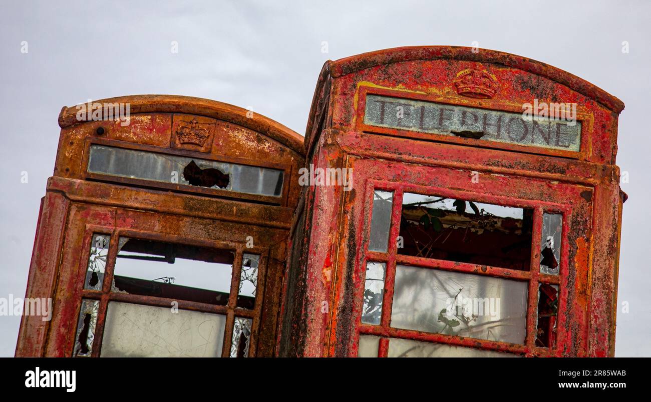 The old rusty red telephone boxes Stock Photo - Alamy