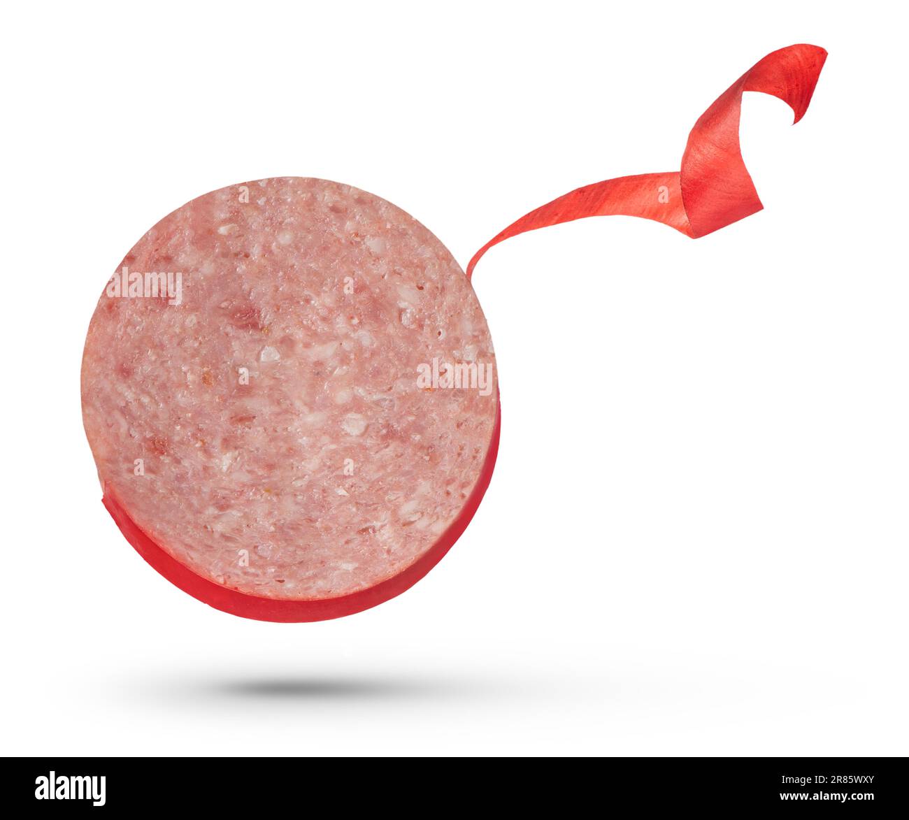 A slice of salami sausage on a white isolated background. The process ...