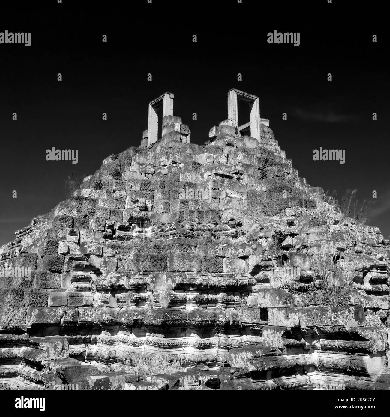 Skyward view of an ancient stone pyramid top from Cambodia, a medieval ...