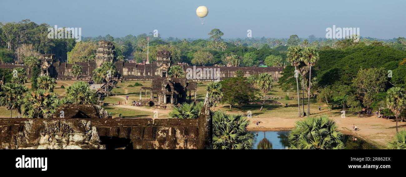 Balloon floating over Angkor temple complex ruins Stock Photo - Alamy