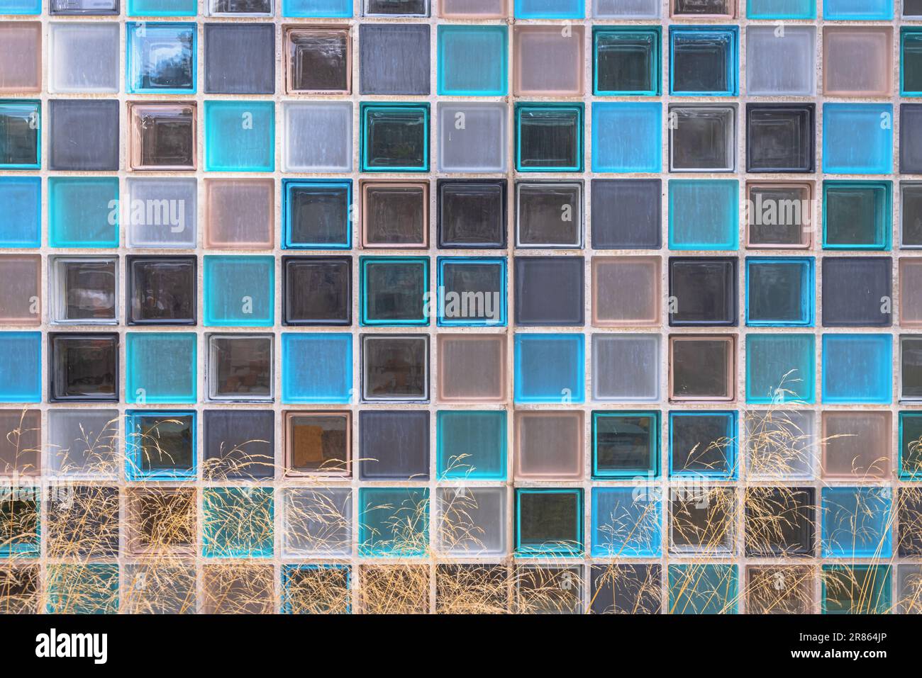 Colored glass tiles background as exterior wall on a facade. Building ...