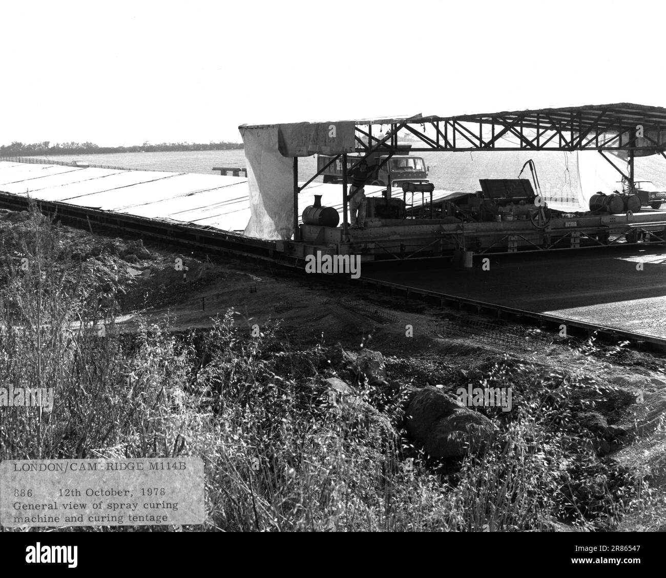 Construction of the M11 MotorwayRoad worker Stock Photo - Alamy