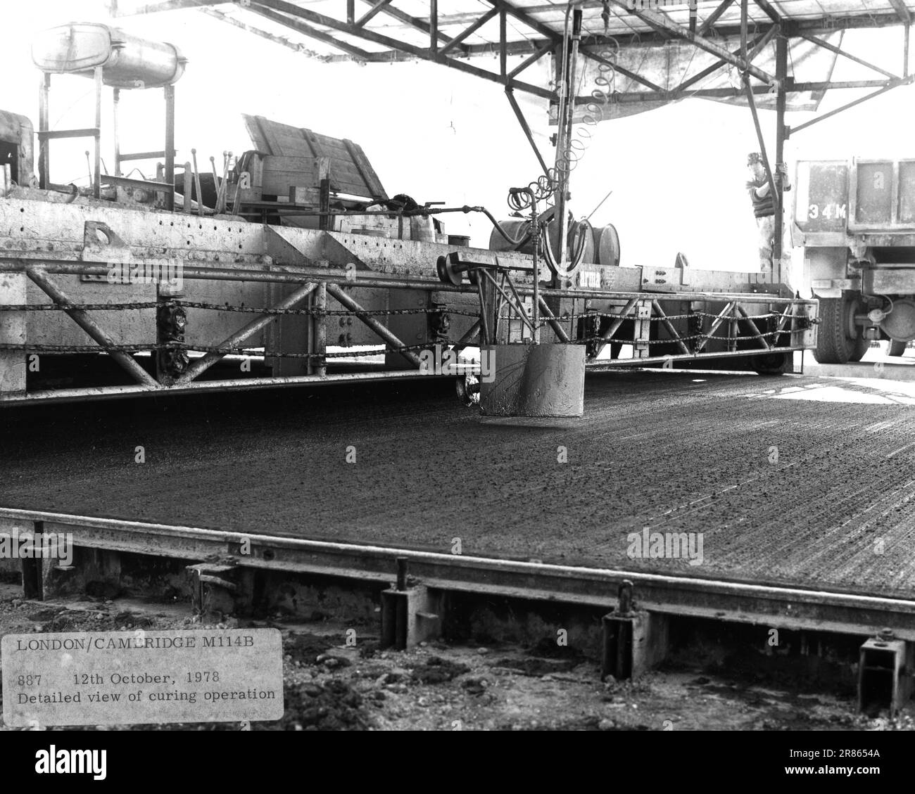 Construction of the M11 MotorwayRoad worker Stock Photo - Alamy