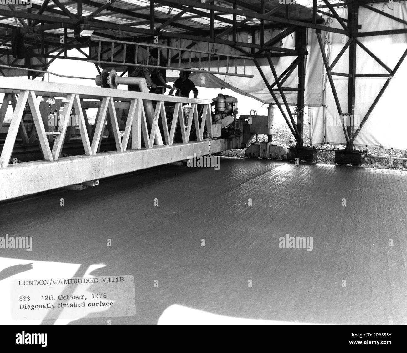 Construction of the M11 MotorwayRoad worker Stock Photo - Alamy