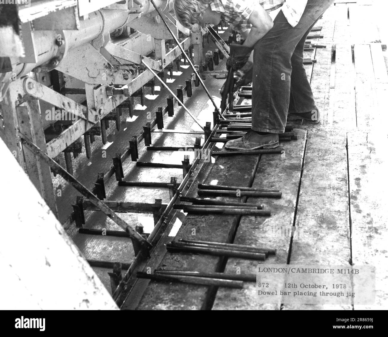 Construction of the M11 MotorwayRoad worker Stock Photo - Alamy
