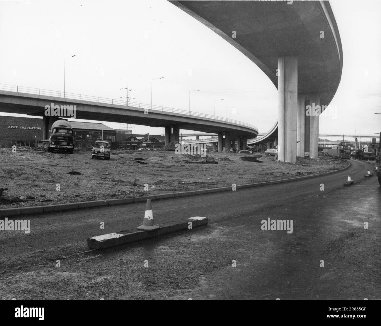 Construction of the M11 MotorwayRoad worker Stock Photo - Alamy