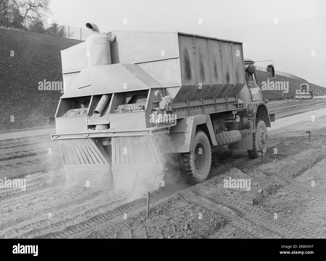 Construction of the M11 MotorwayRoad worker Stock Photo - Alamy