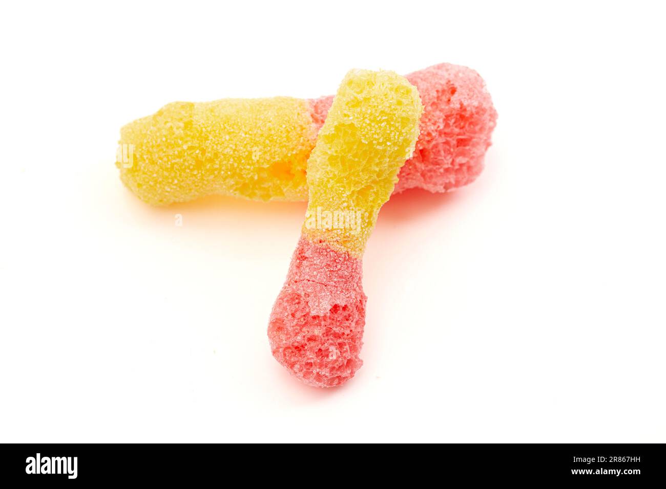 Freeze Dried Bicolored Candy Sour Worms Isolated on a White Background ...