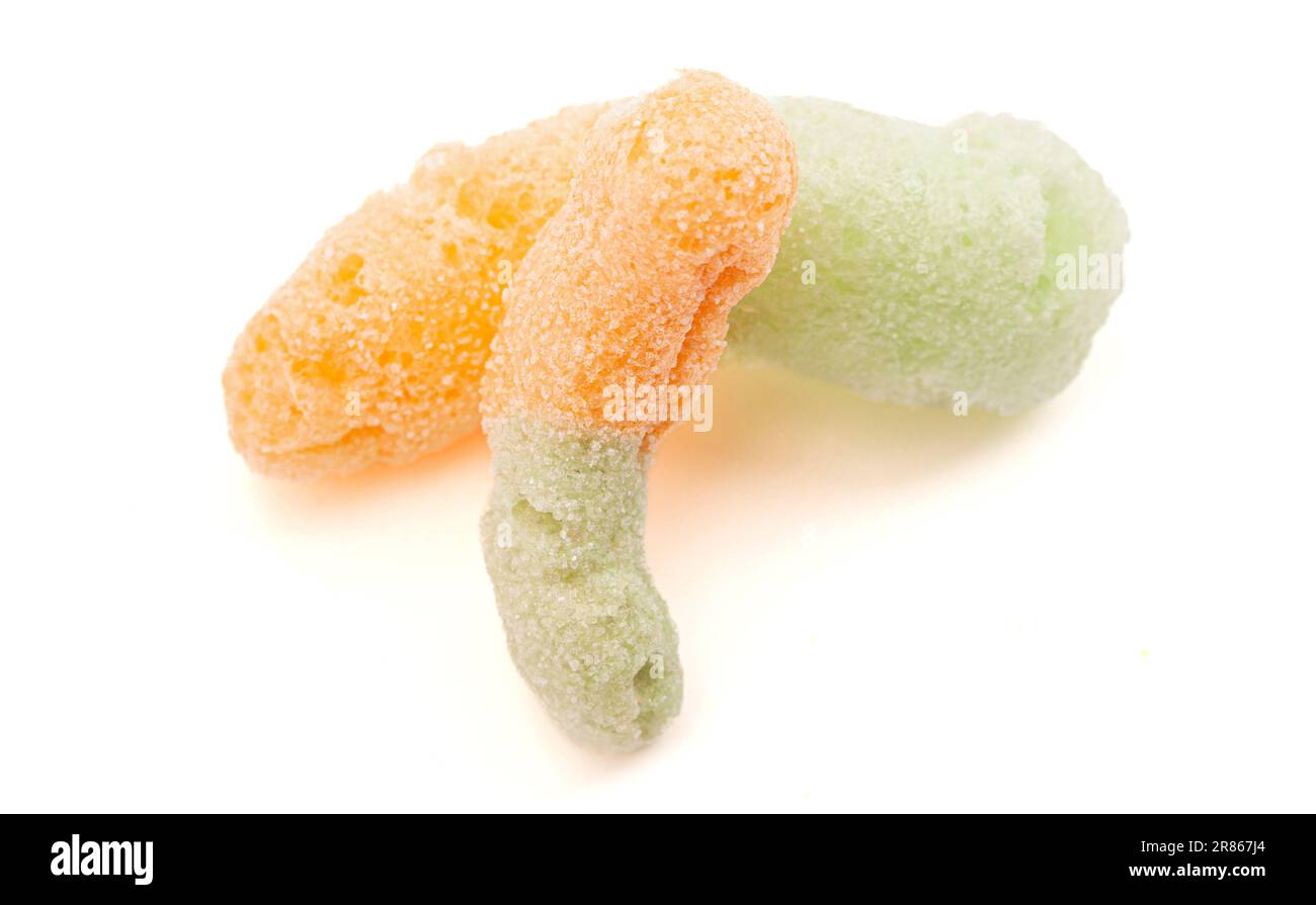 Freeze Dried Bicolored Candy Sour Worms Isolated on a White Background ...