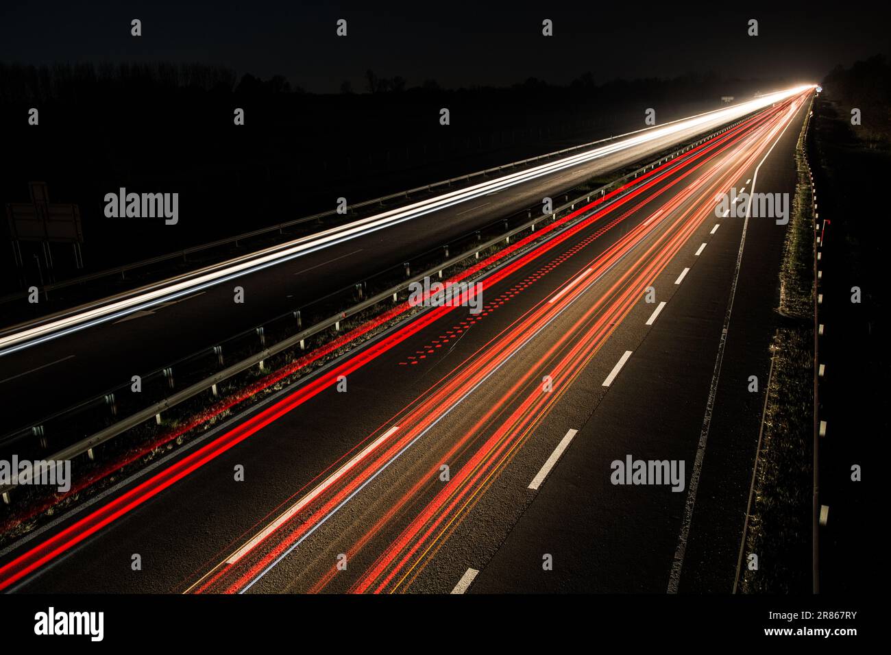 evening highway with long exposure at dark Stock Photo - Alamy