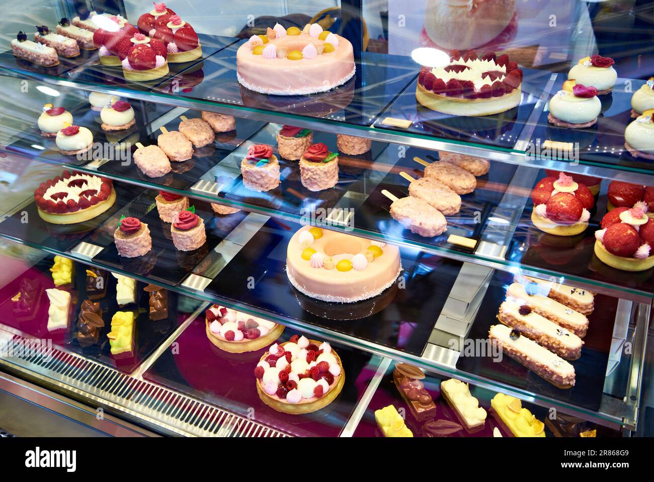 Cakes on the counter in the store Stock Photo - Alamy