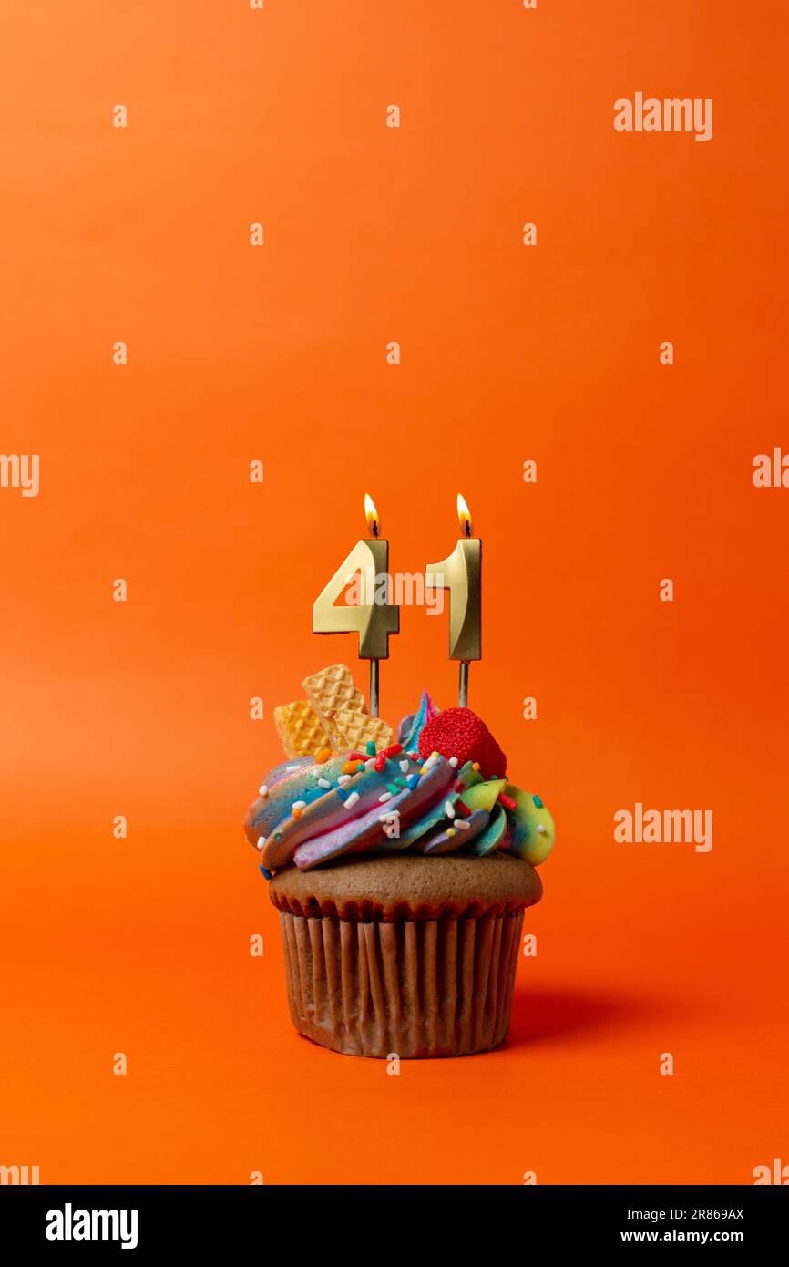 birthday cake with number 41 - cupcake on orange background with ...